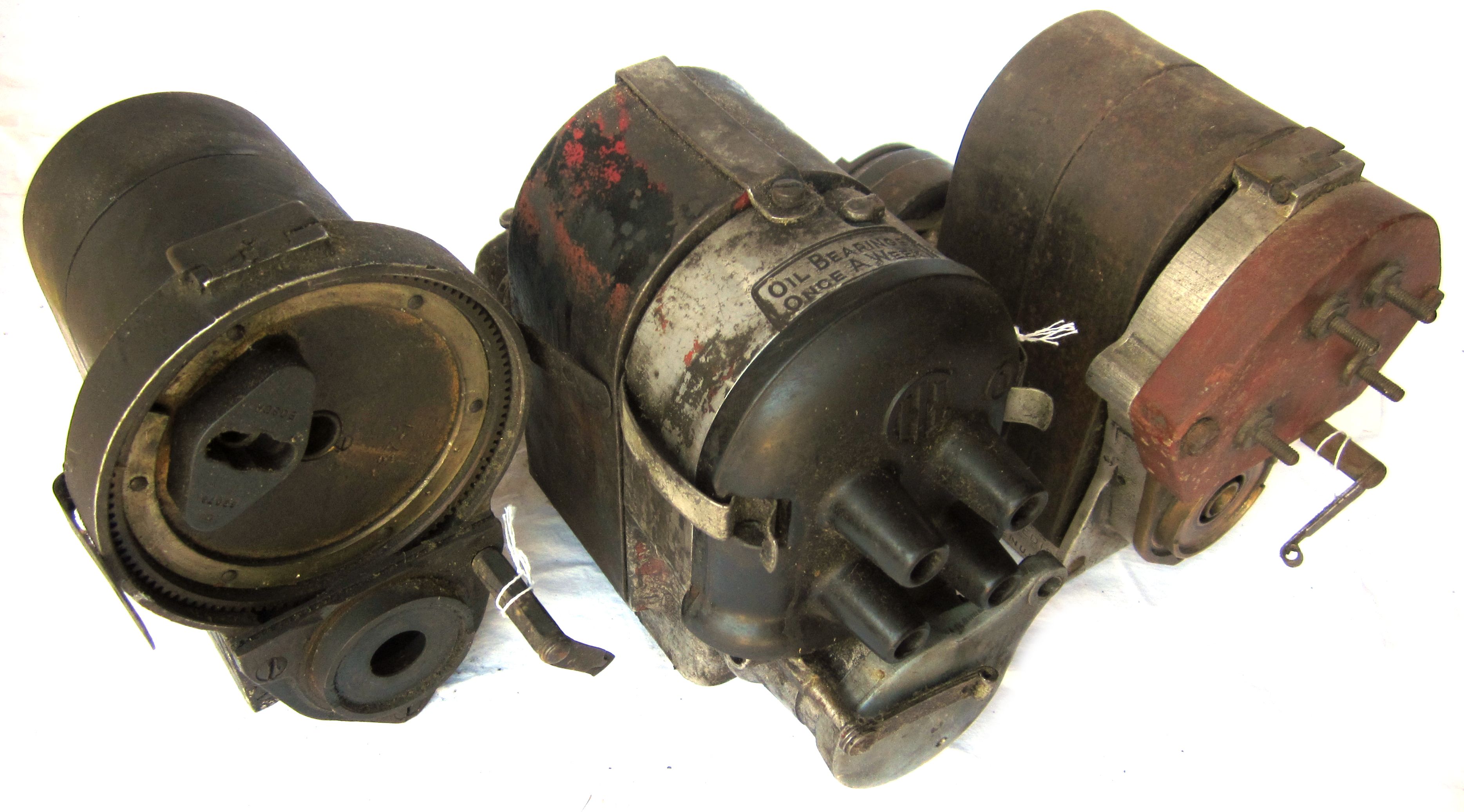 Bonhams Cars : A Bosch magneto with two others for parts,