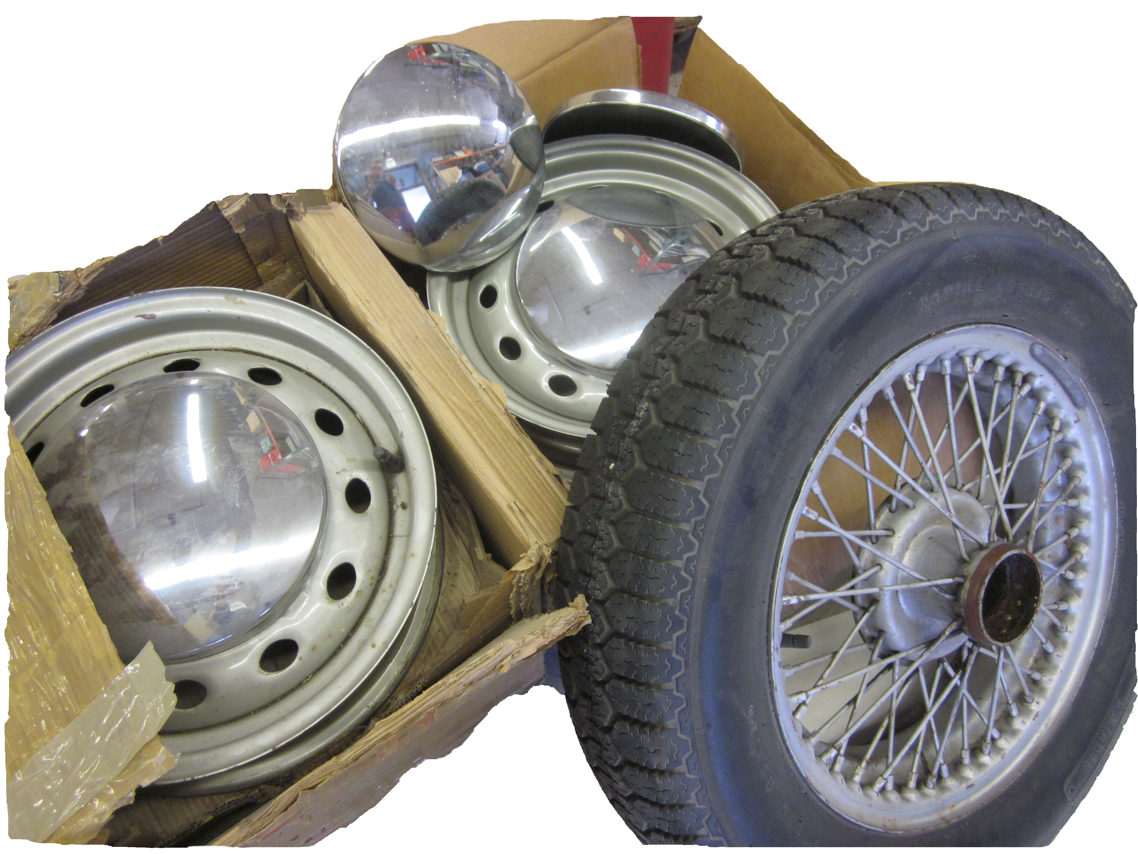 Bonhams Cars : Two sets of unidentified English make wheels and tires,