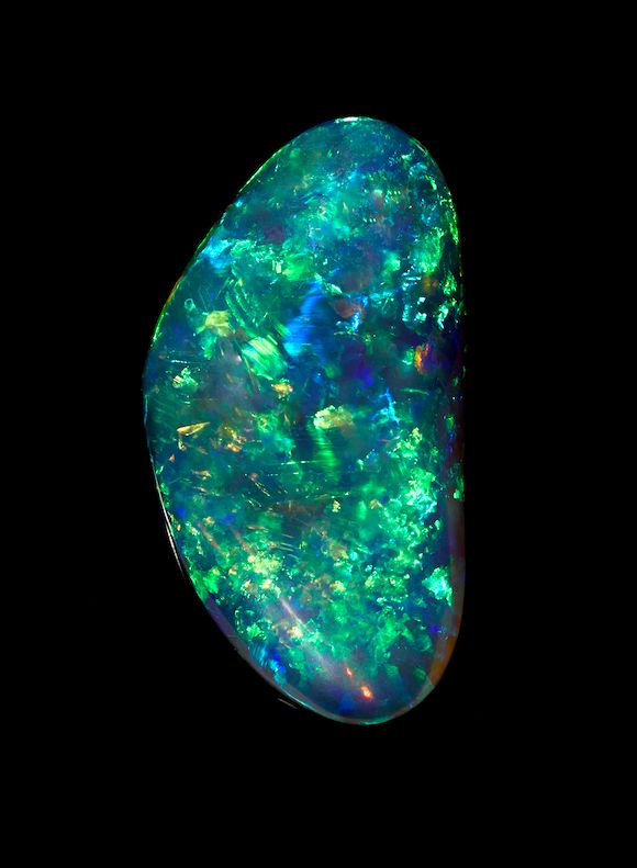 Bonhams : Gem Crystal Opal with Vivid Green-Blue-Orange Fire