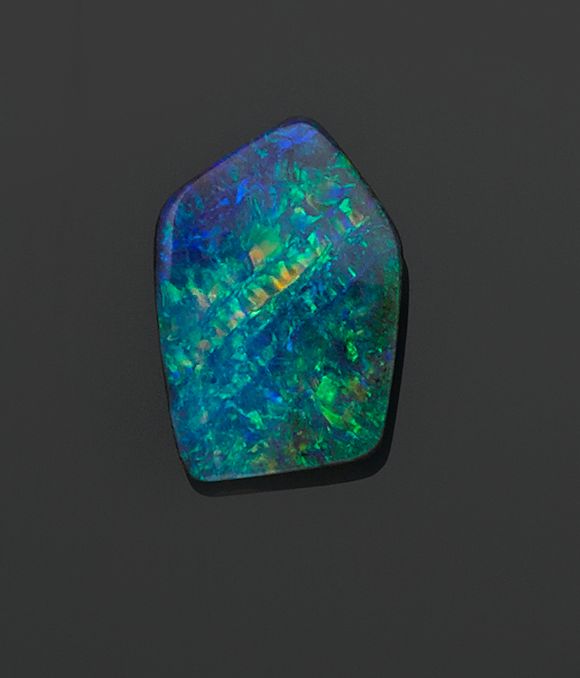 Bonhams : Free-form Boulder Opal with Ribbon Pattern