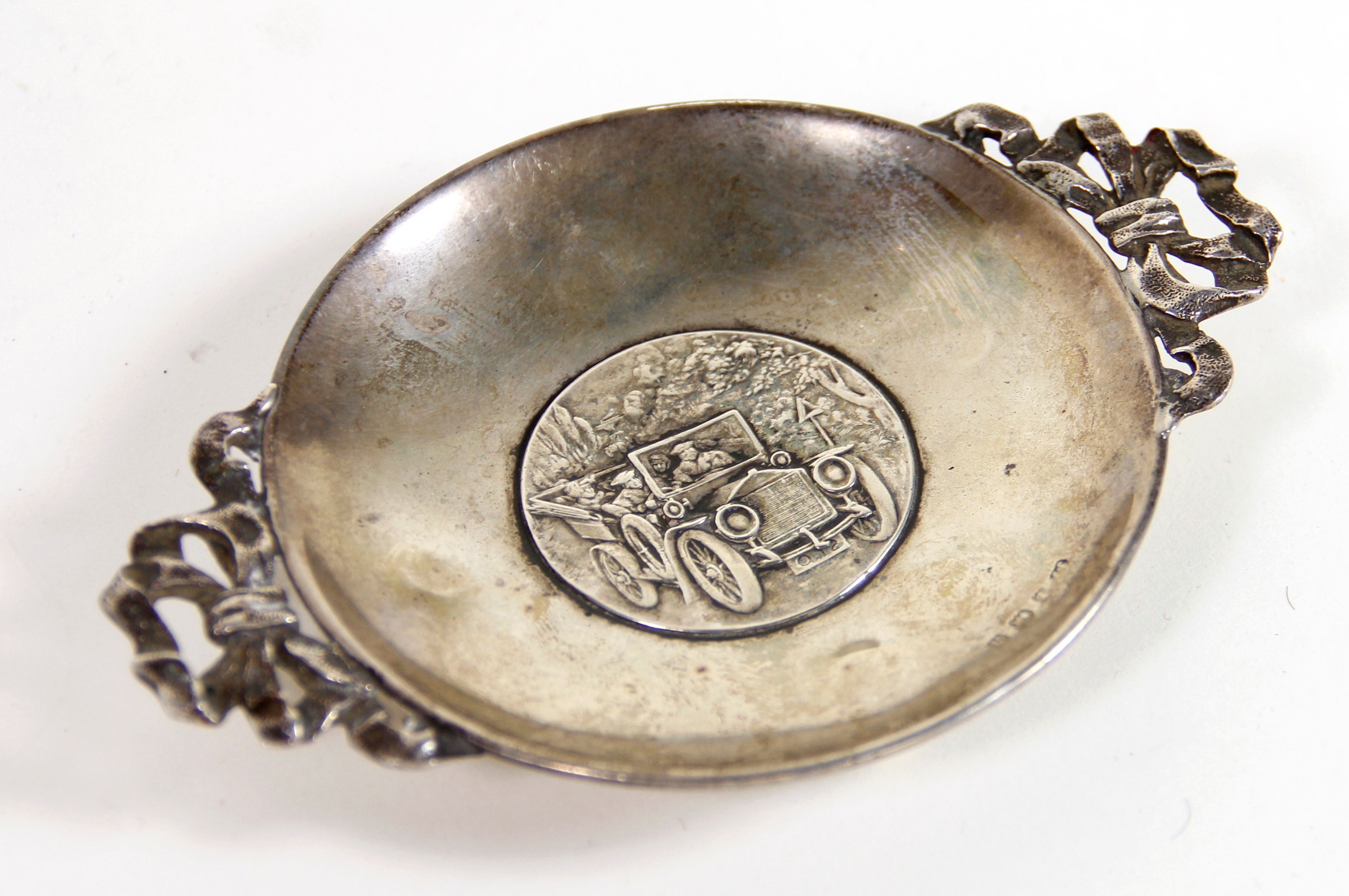 Bonhams Cars : An early sterling silver motoring dish,