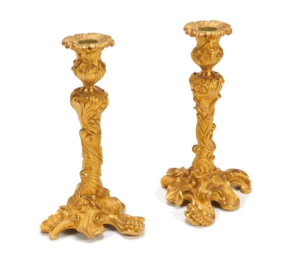 Bonhams : A pair of French gilt bronze candlesticks