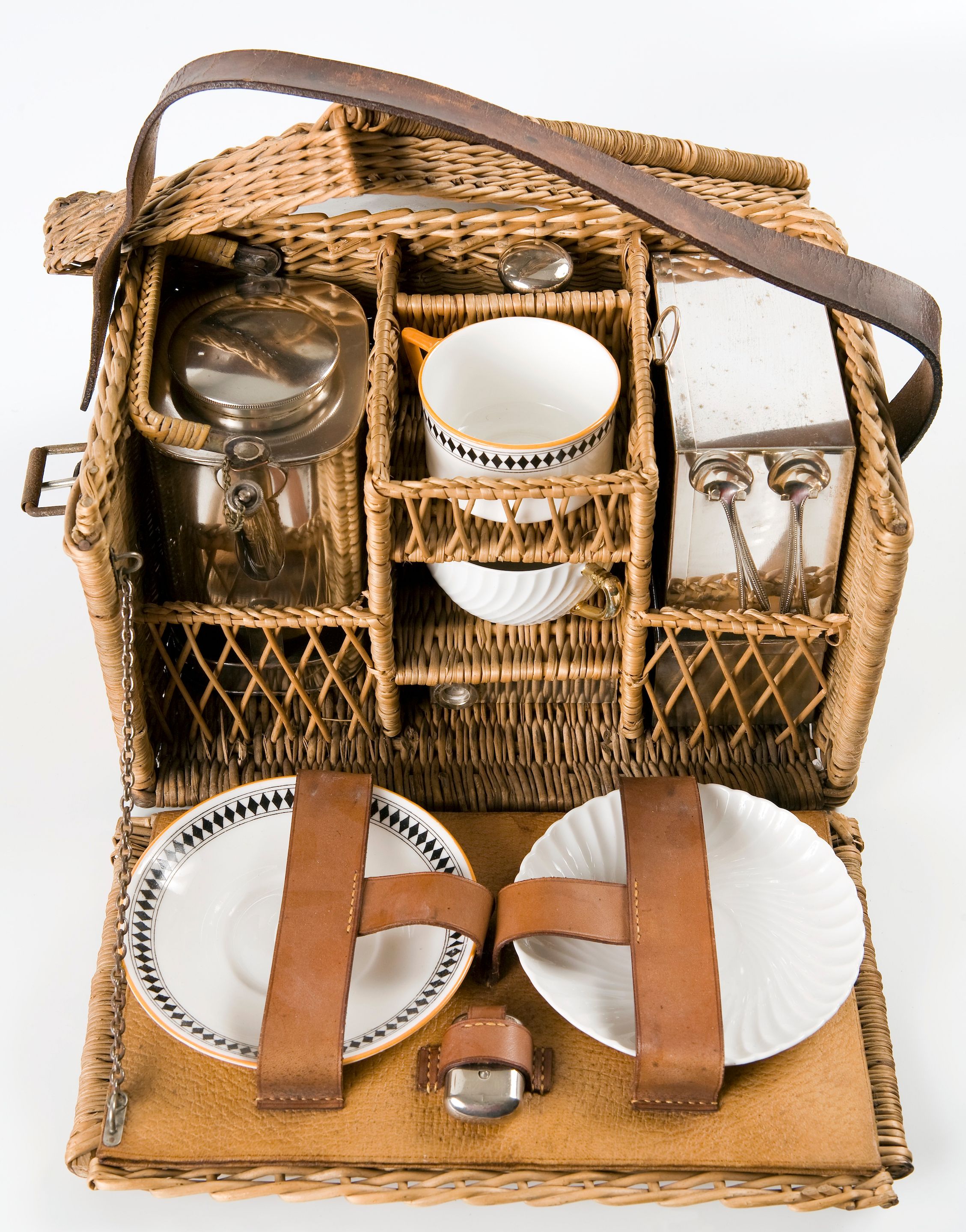 Bonhams Cars : A small two person tea set picnic basket, British, 1920 ...