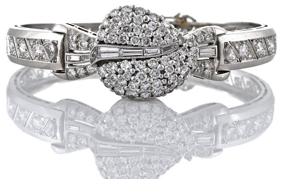 Bonhams : A diamond and platinum covered dial bangle bracelet ...