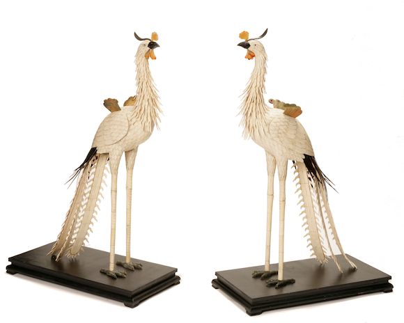 Bonhams : A pair of carved bone model of a Phoenix