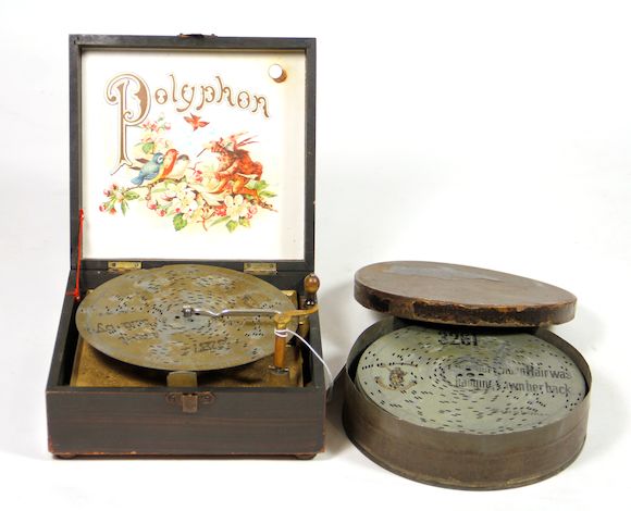 Bonhams : 5 ½" Disc Faux wood Polyphon Music Box