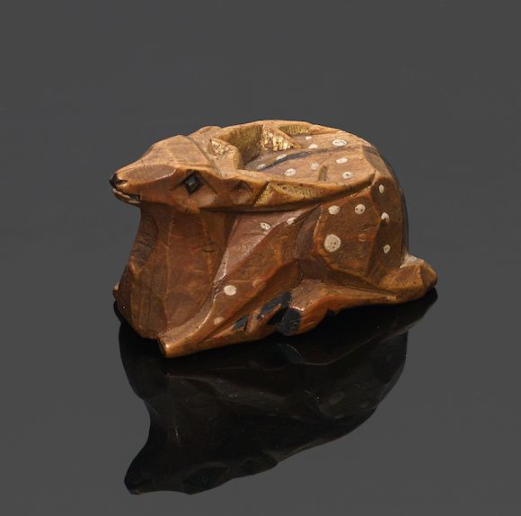 Bonhams : A kiriwood ittobori netsuke 19th century