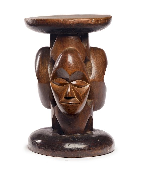 Bonhams : A Modern carved wood African stool