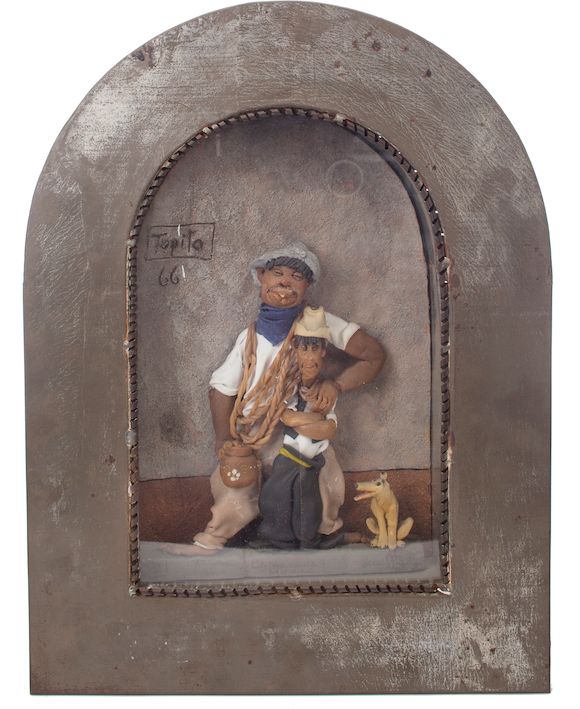 Bonhams : A Mexican tin arched retablo frame mid-20th century