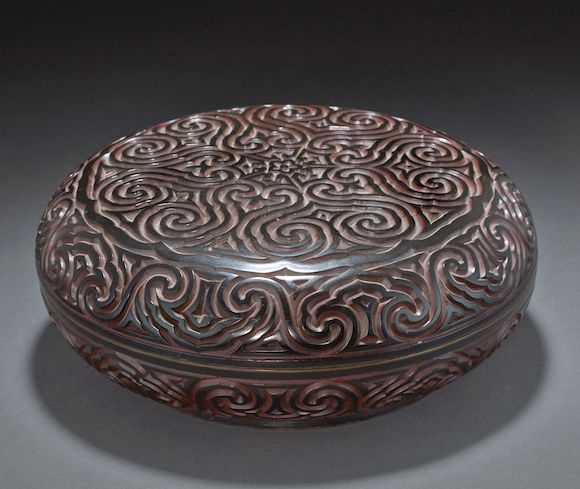 Bonhams : A carved tixi lacquer circular box
