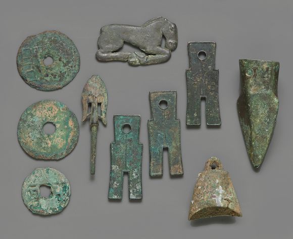 Bonhams : A group of small archaic style bronzes