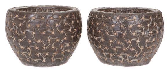 Bonhams : A pair of carved Celtic style stone planters