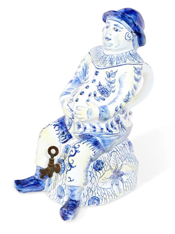 Bonhams : A Dutch delft blue and white spirit keg modeled as a Dutchman ...