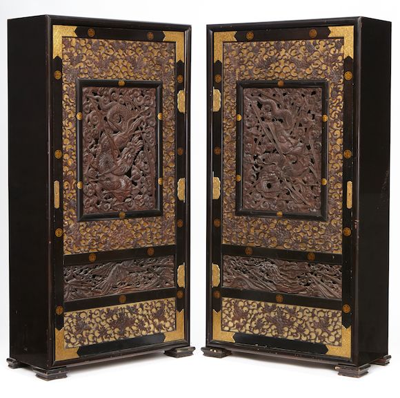 Bonhams : A pair of Japanese gilt metal and carved relief wood panel ...