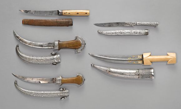 Bonhams : A group of five silver-mounted Middle Eastern daggers