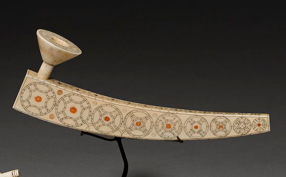 Bonhams : An Eskimo scrimshaw ivory pipe