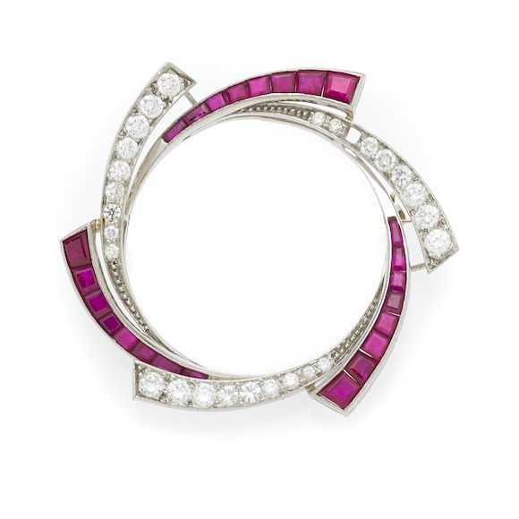 Bonhams : A diamond and ruby circle brooch