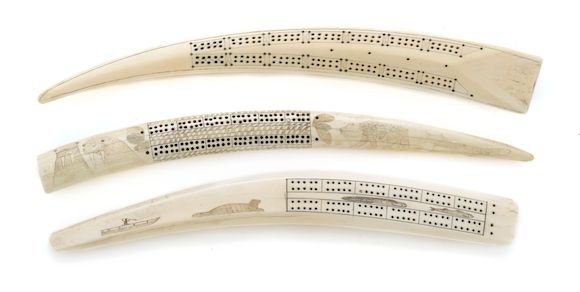 Bonhams : Three Eskimo walrus ivory cribbage boards