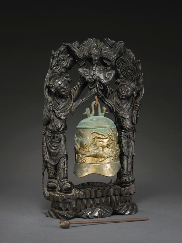 Bonhams : A rosewood carved bell stand with brass bell