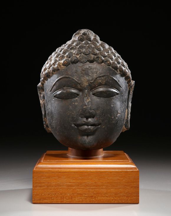 Bonhams : A black marble head of a Jina Western India, circa 12th century
