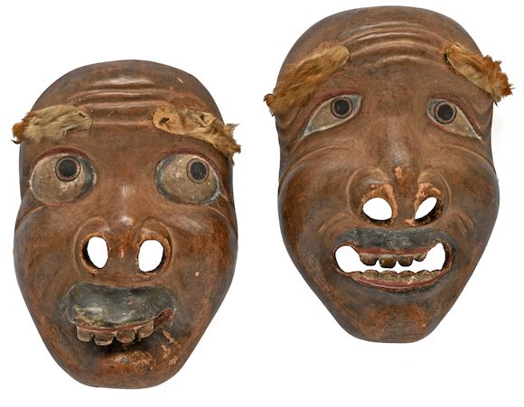 Bonhams : Two oversize wood folk masks Edo period (19th century)