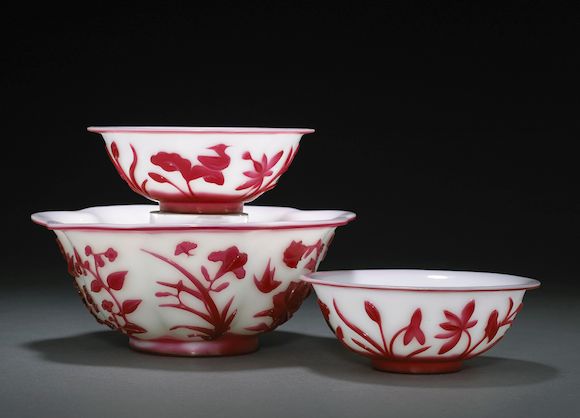 Bonhams : A group of three red and white glass bowls