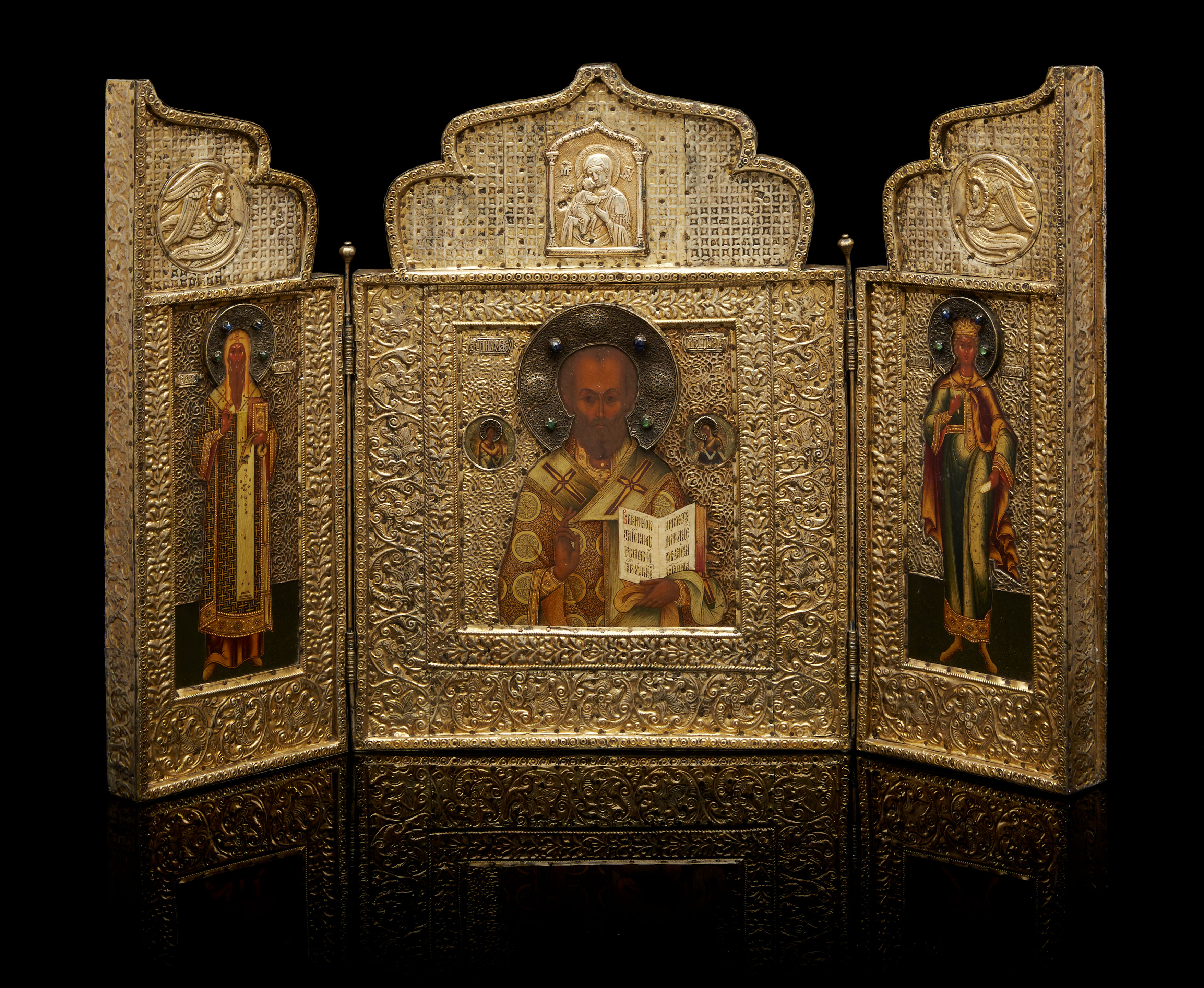 Bonhams : A silver-gilt folding triptych icon of Saint Nicholas the Miracle Worker, Saint Alexis ...