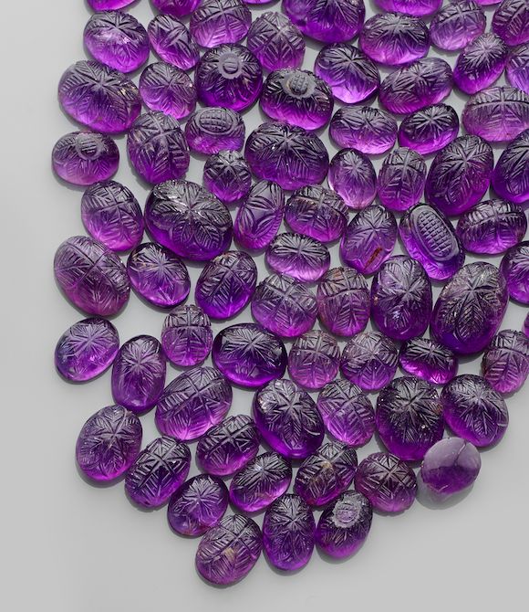Bonhams : Large Group of Carved Amethyst Cabochons