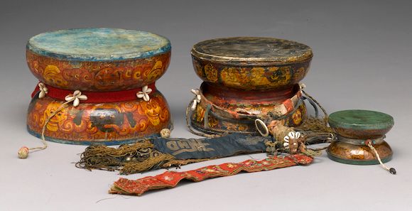 Bonhams : Three painted ritual wood drums Tibet, 19th century