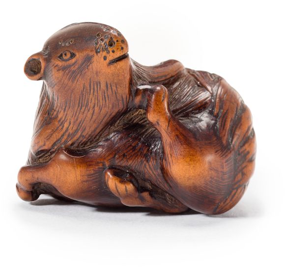 Bonhams : A wood netsuke of a recumbent goat Edo period (1615-1868 ...