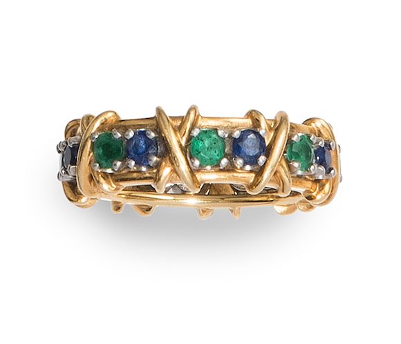Bonhams : An emerald, sapphire, 18k gold and platinum 'Sixteen Stones ...