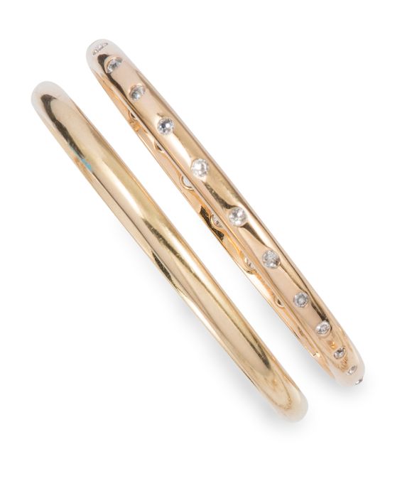 Bonhams : Two diamond and 14k gold bangle bracelets