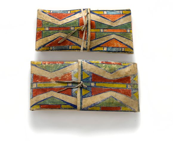 Bonhams : Two Crow parfleche envelopes