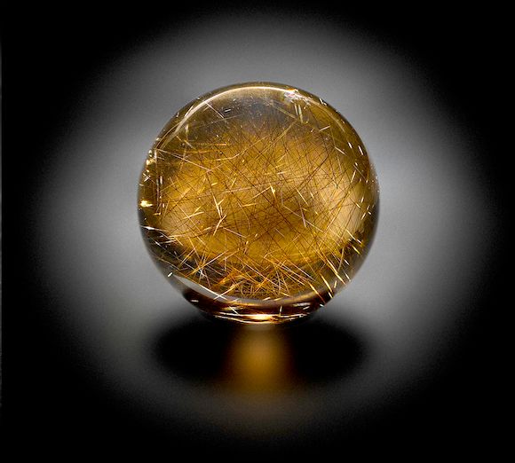 Bonhams : Large, Clear Smoky Quartz with Pin-fire Rutile Sphere