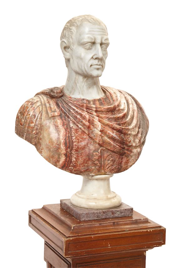 Bonhams : A carved marble bust of a Roman nobleman on a paint decorated ...