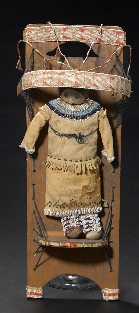 Bonhams : A Cree model cradle and doll