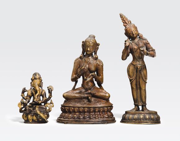 Bonhams : A group of three copper alloy figures