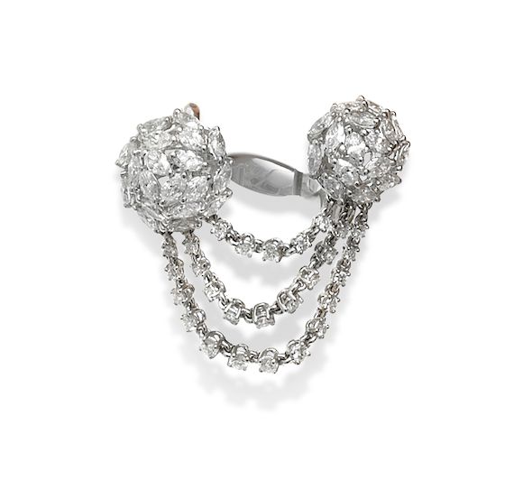 Bonhams : A diamond and 18k white gold swag ring