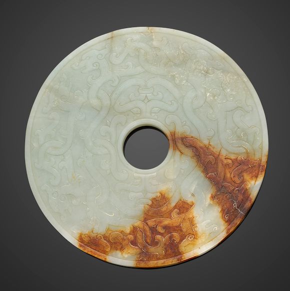 Bonhams : A carved jade bi disk Mid-Qing dynasty or later