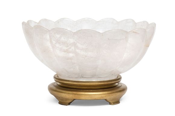 Bonhams : A rock crystal center bowl on giltwood stand