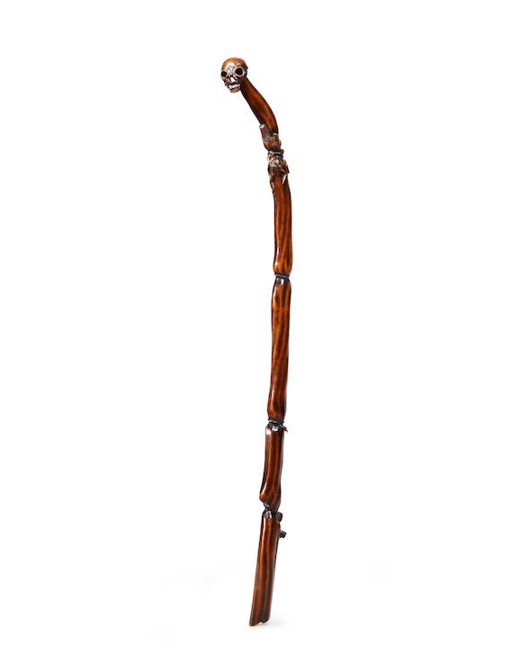 Bonhams : GYOKURYŪSAI 玉龍斎 A hardwood scepter in the form of a skull and ...