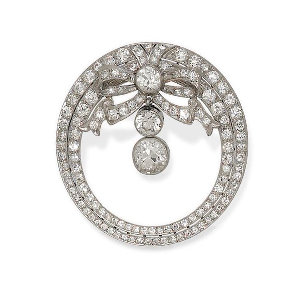 Bonhams : A diamond and platinum circle brooch