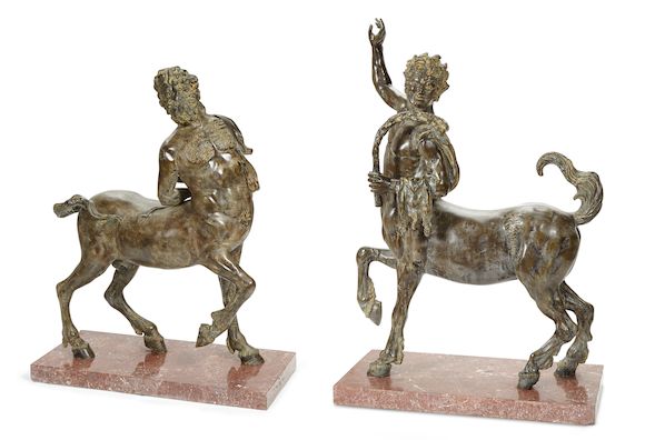 Bonhams : A pair of patinated bronze figures of centaurs on marble plinths