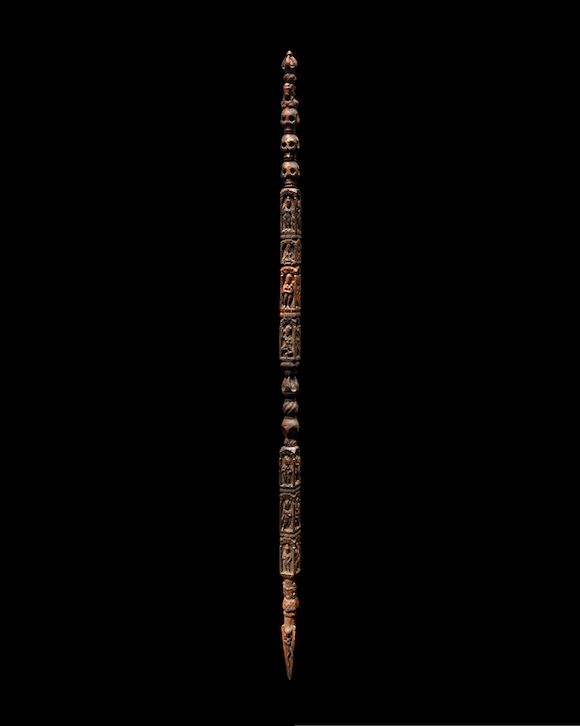 Bonhams : A WOOD RITUAL STAFF NEPAL, 10TH-13TH CENTURY