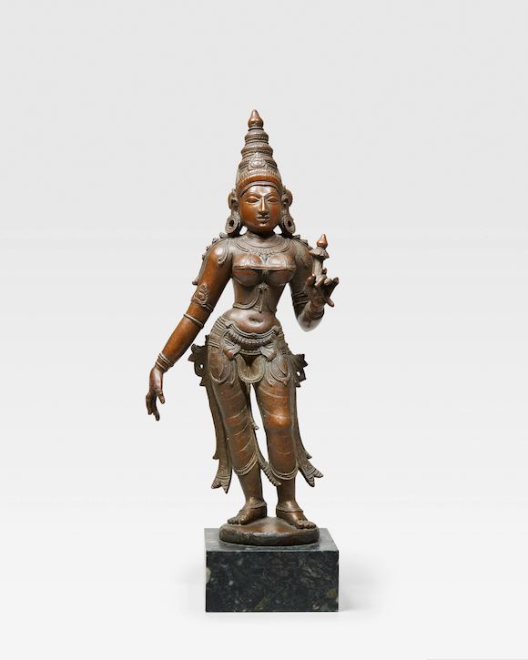Bonhams : A LARGE COPPER ALLOY FIGURE OF BHUDEVI SOUTH INDIA, 16TH/17TH ...