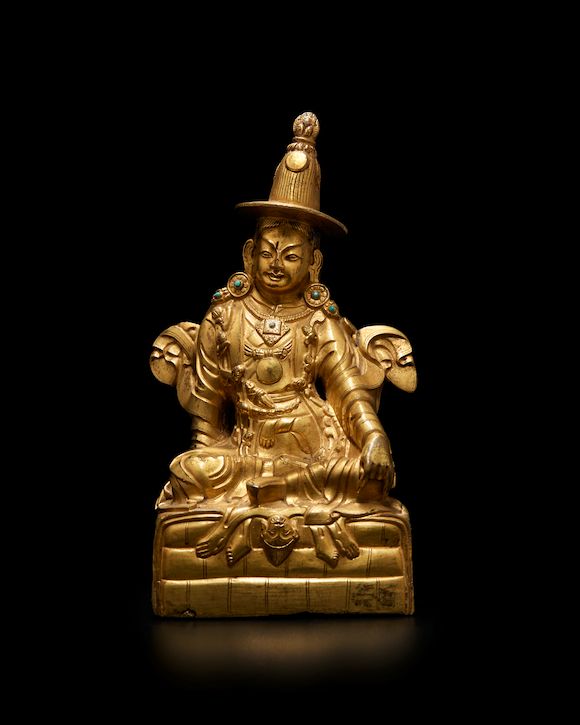 Bonhams : A GILT COPPER ALLOY FIGURE OF KING GESAR DERGE, EASTERN TIBET ...