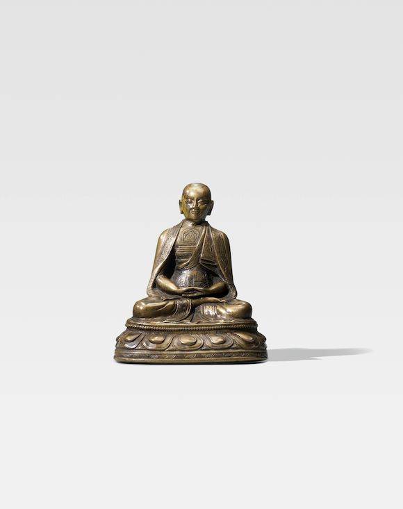 Bonhams : A COPPER ALLOY FIGURE OF SENGGE GYALTSEN TIBET, 14TH/15TH CENTURY
