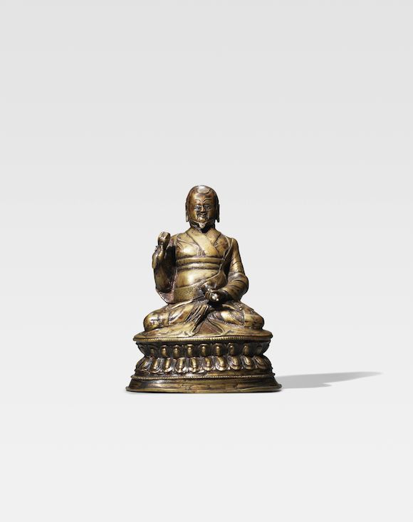 Bonhams : A COPPER ALLOY FIGURE OF A SAKYA LAMA TIBET, 16TH CENTURY