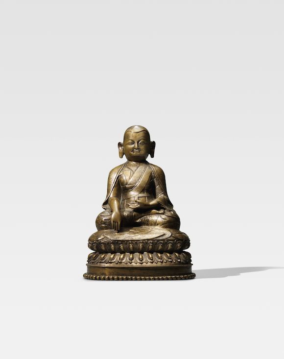 Bonhams : A COPPER ALLOY FIGURE OF A SAKYA LAMA TIBET, 15TH CENTURY