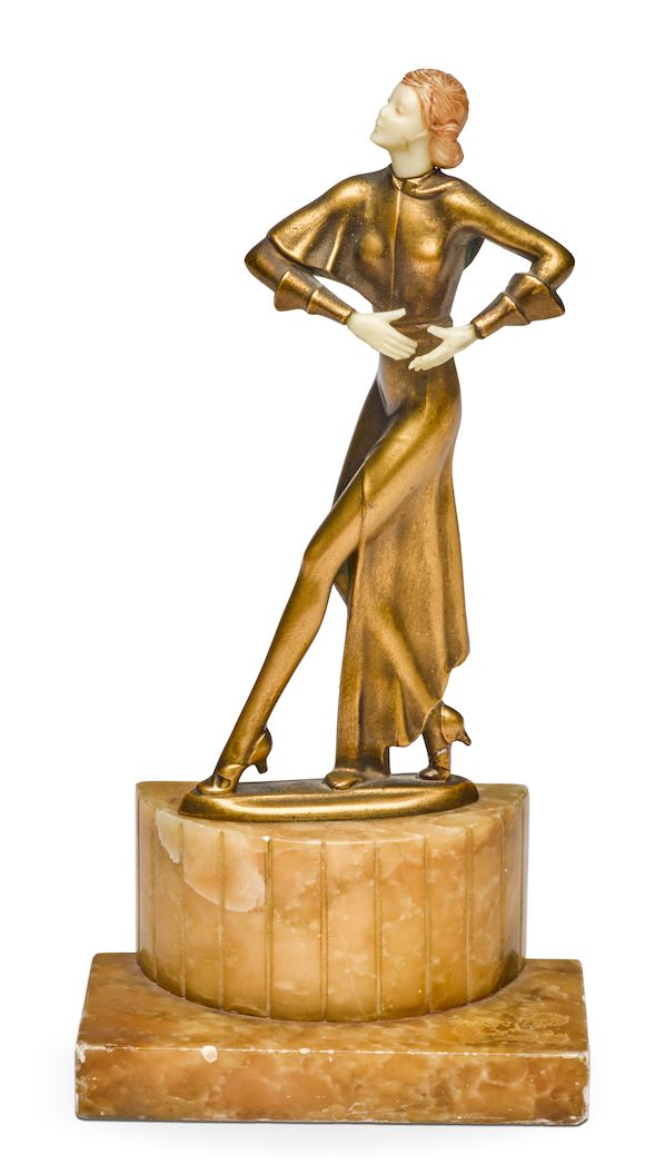 Bonhams : An Austrian Art Deco spelter, composition and stained ...